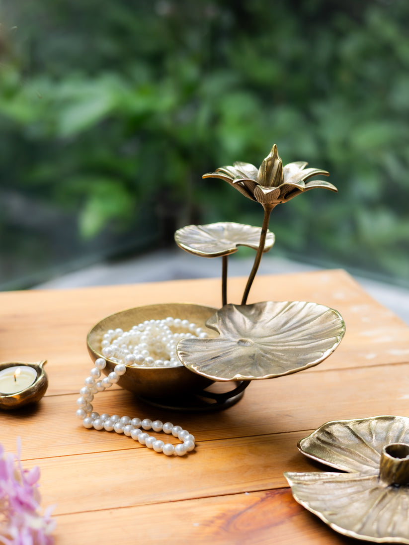 Handmade lotus urli made in brass with bronze patina finish is just perfect for table decor ...